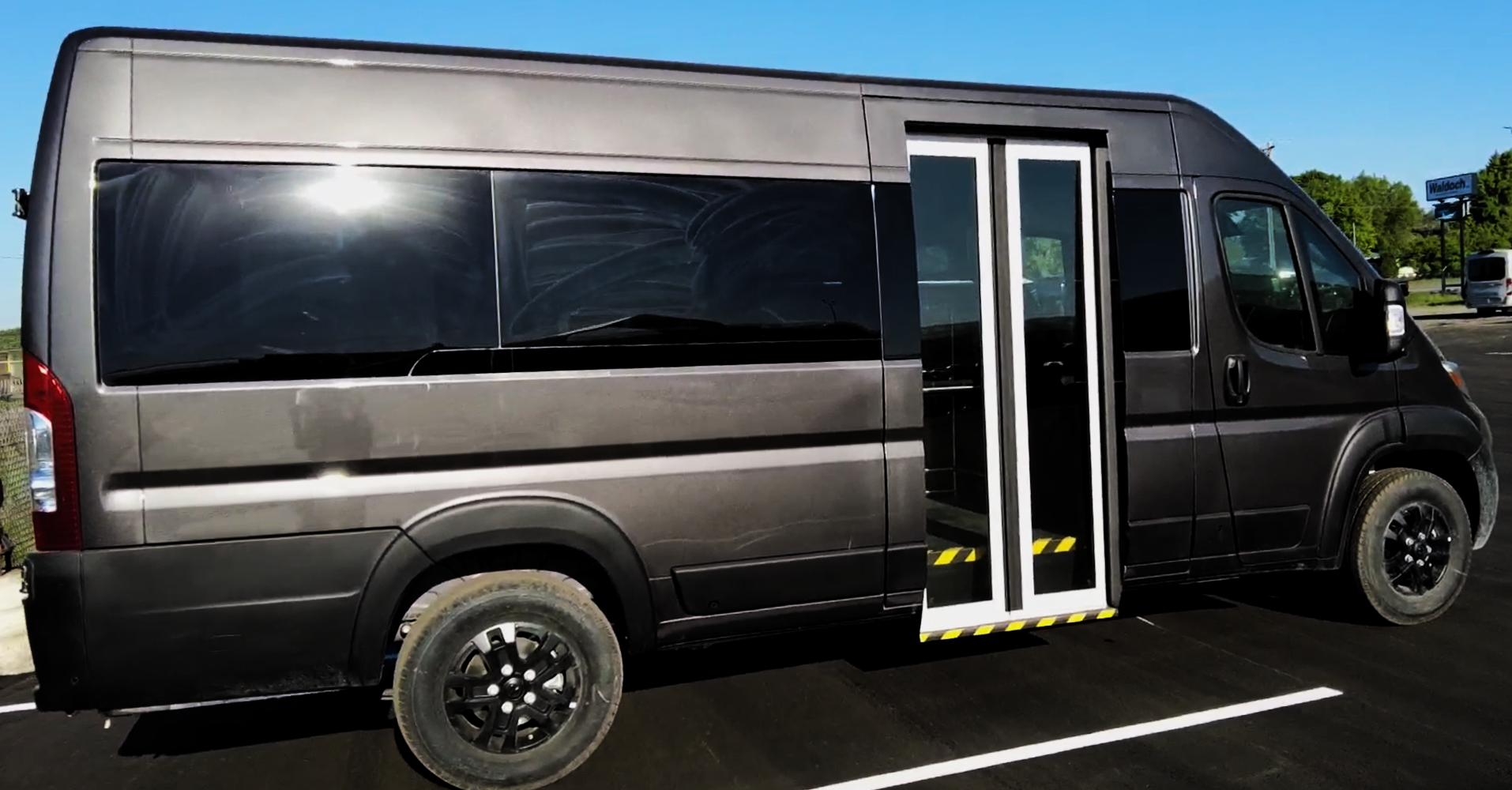 Ford Transit Shuttle with Bus Door - Waldoch